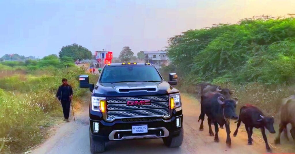 Watch GMC Sierra Drive Thru Indian Village with 2 Mercedes G-Wagons ...