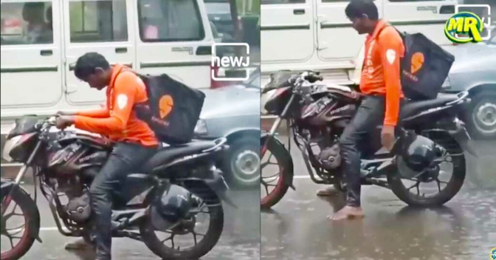 Swiggy Delivery Agent Waits in Rain at Traffic Lights, IPS Officer ...