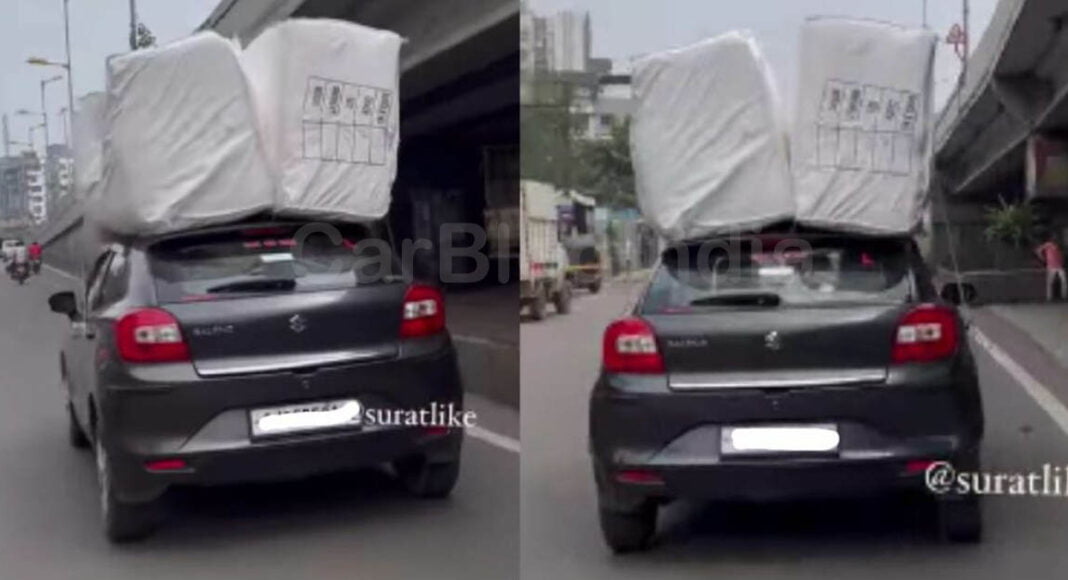 Maruti Baleno Seen Carrying Heavy Load on Roof